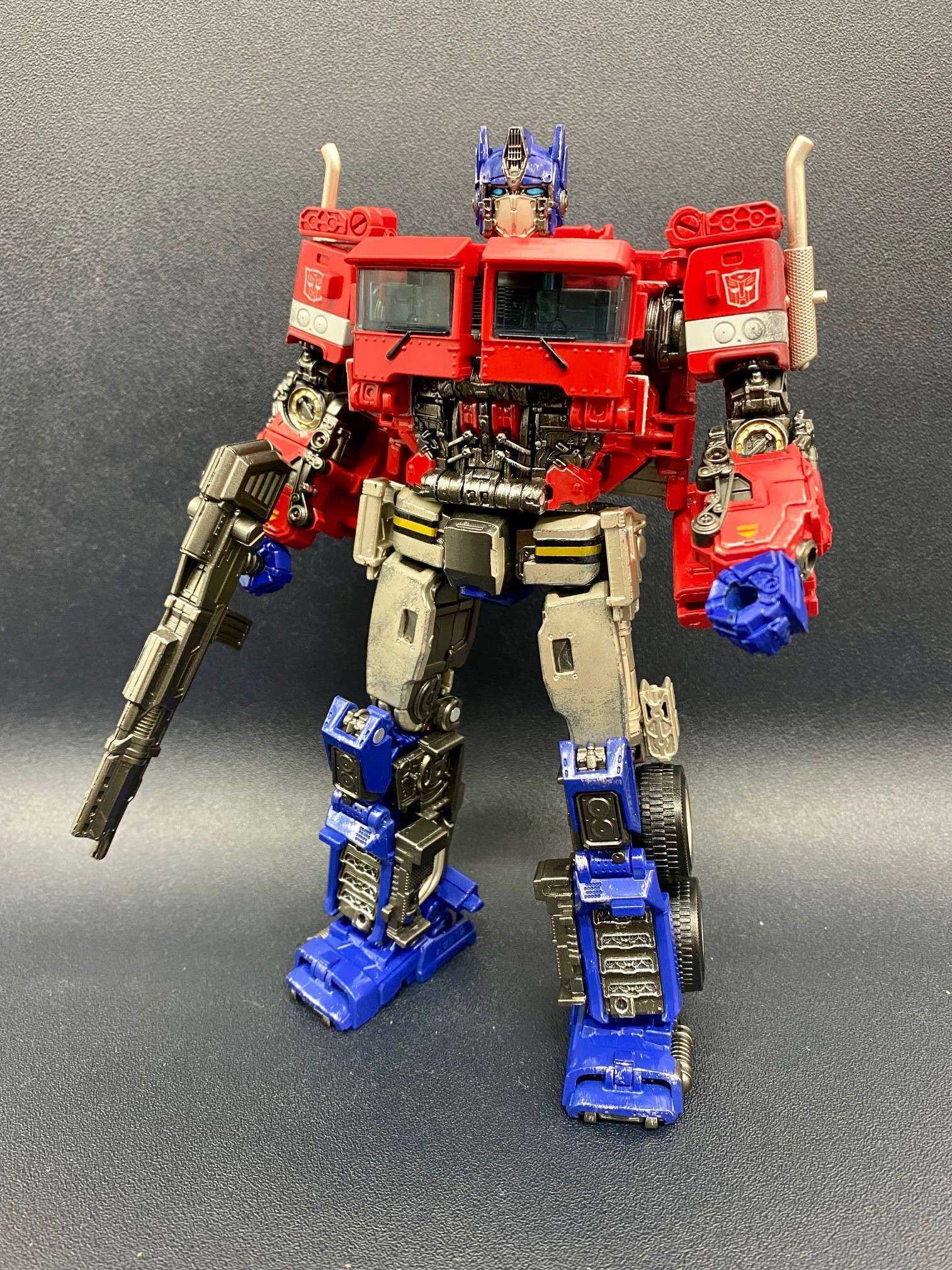 Transformers Premium Finish Optimus Prime and Megatron In-Hand Images ...